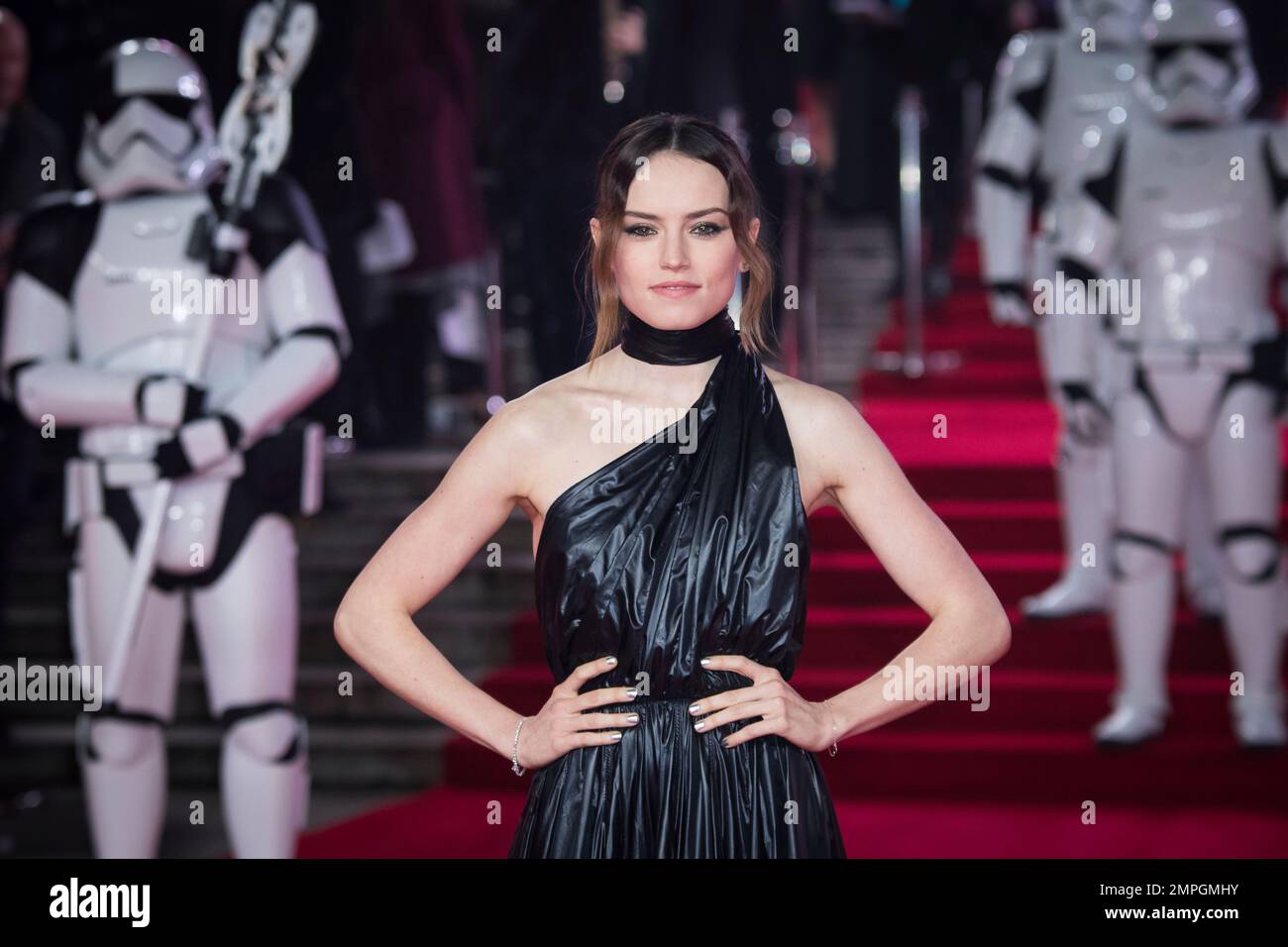 Actress Daisy Ridley poses for photographers upon arrival at the ...