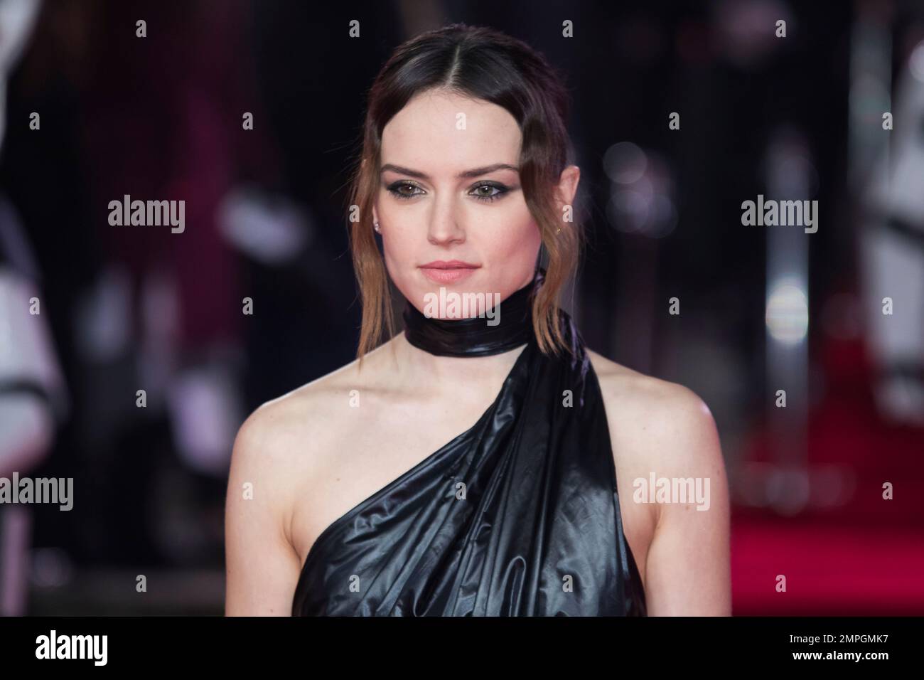 Actress Daisy Ridley poses for photographers upon arrival at the ...