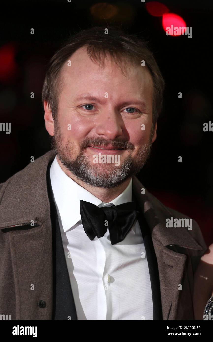 Director Rian Johnson poses for photographers upon arrival at the ...