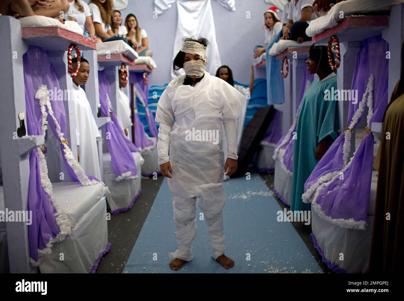 An inmate poses for a photo dressed in her costume at the end of her ...