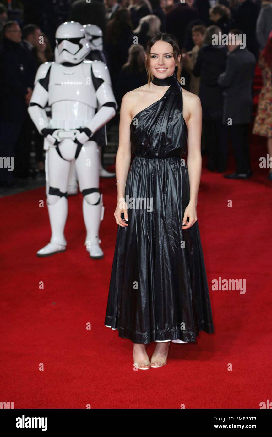Actress Daisy Ridley poses for photographers upon arrival at the ...
