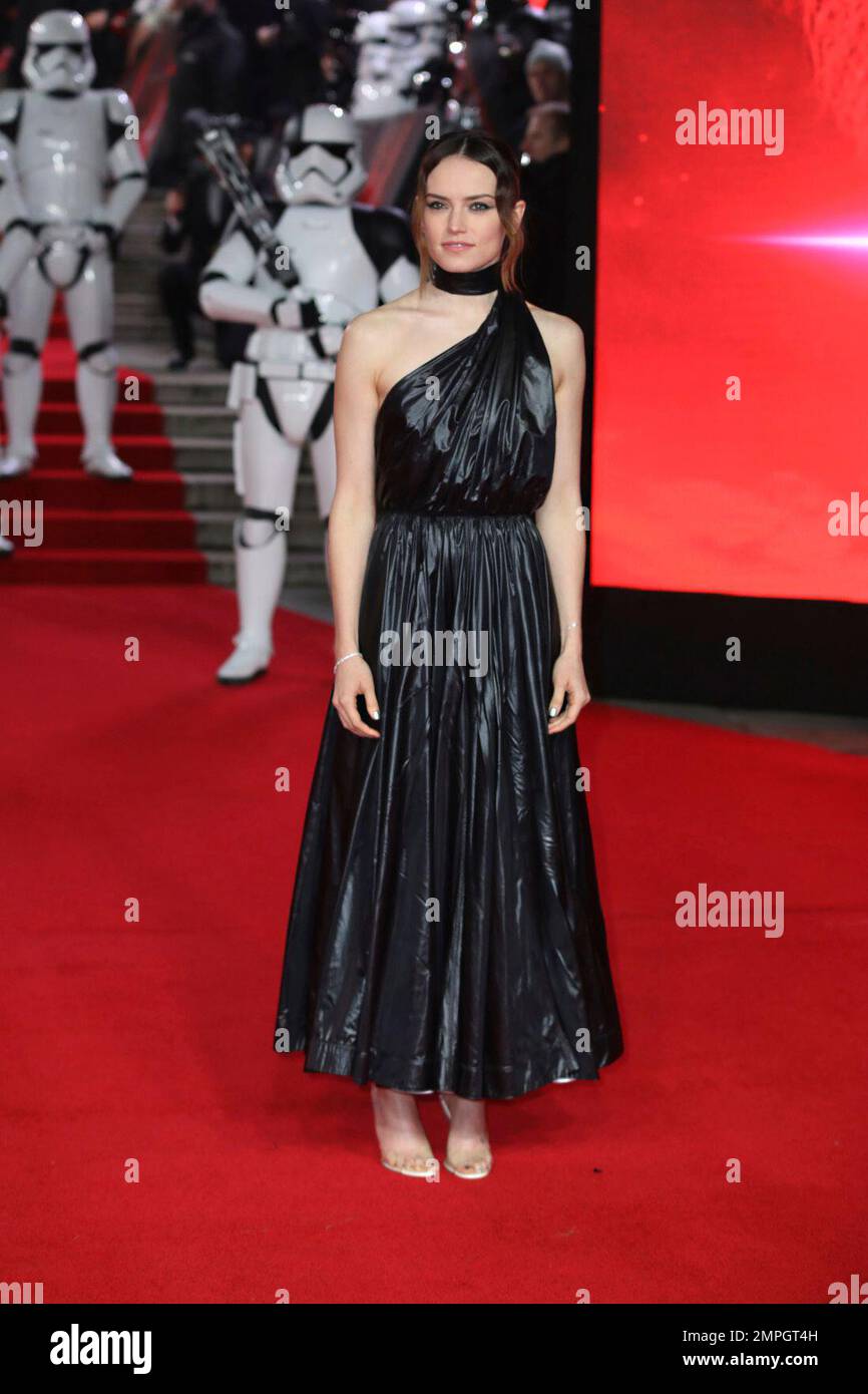 Actress Daisy Ridley poses for photographers upon arrival at the ...