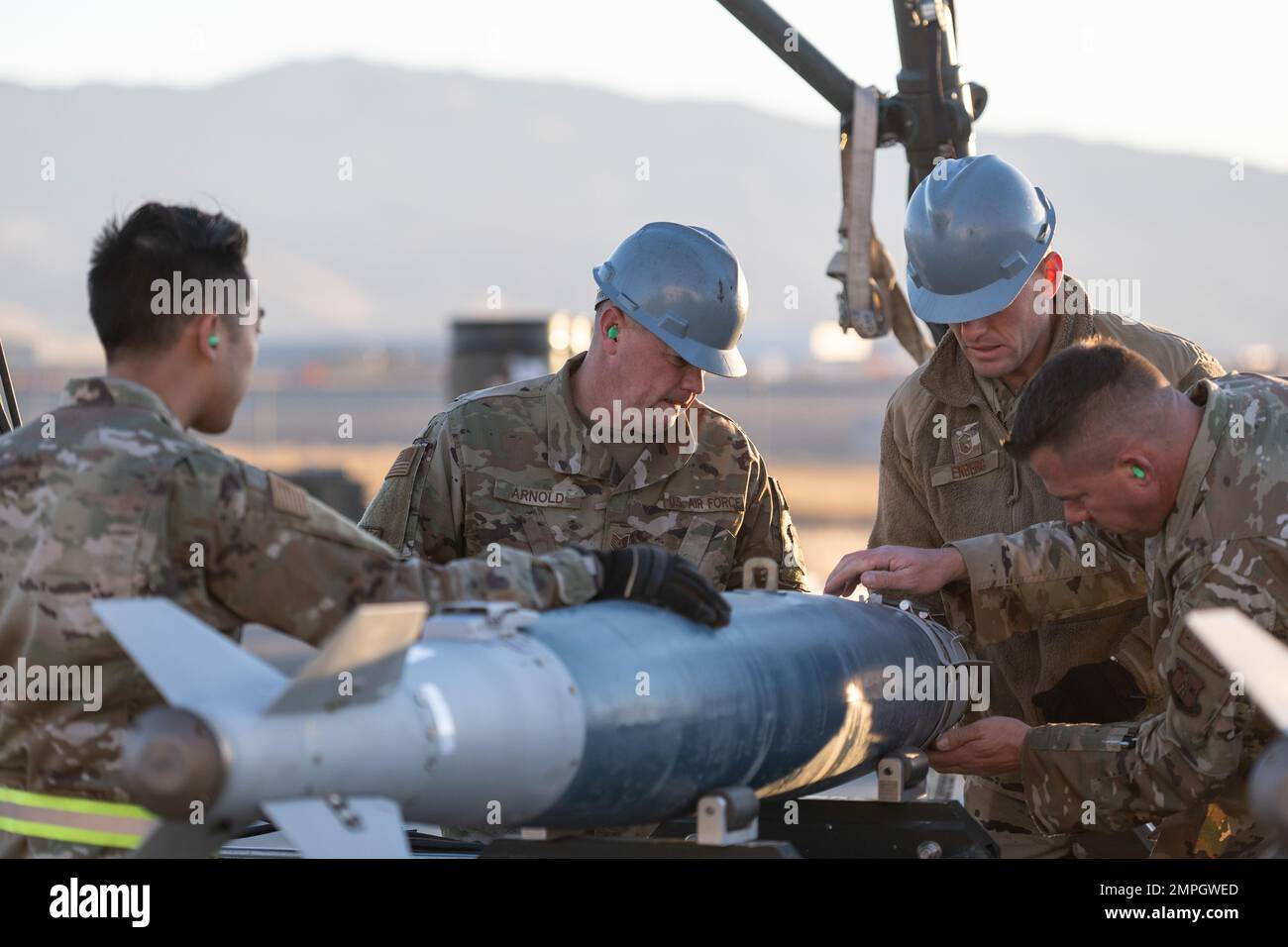 Munitions Systems Airmen with the 124th Munitions Flight assemble a GBU-38 bomb kit during the ...
