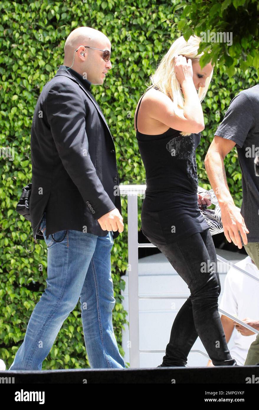 Britney Spears and Jason Trawick stroll together accompanied by a ...