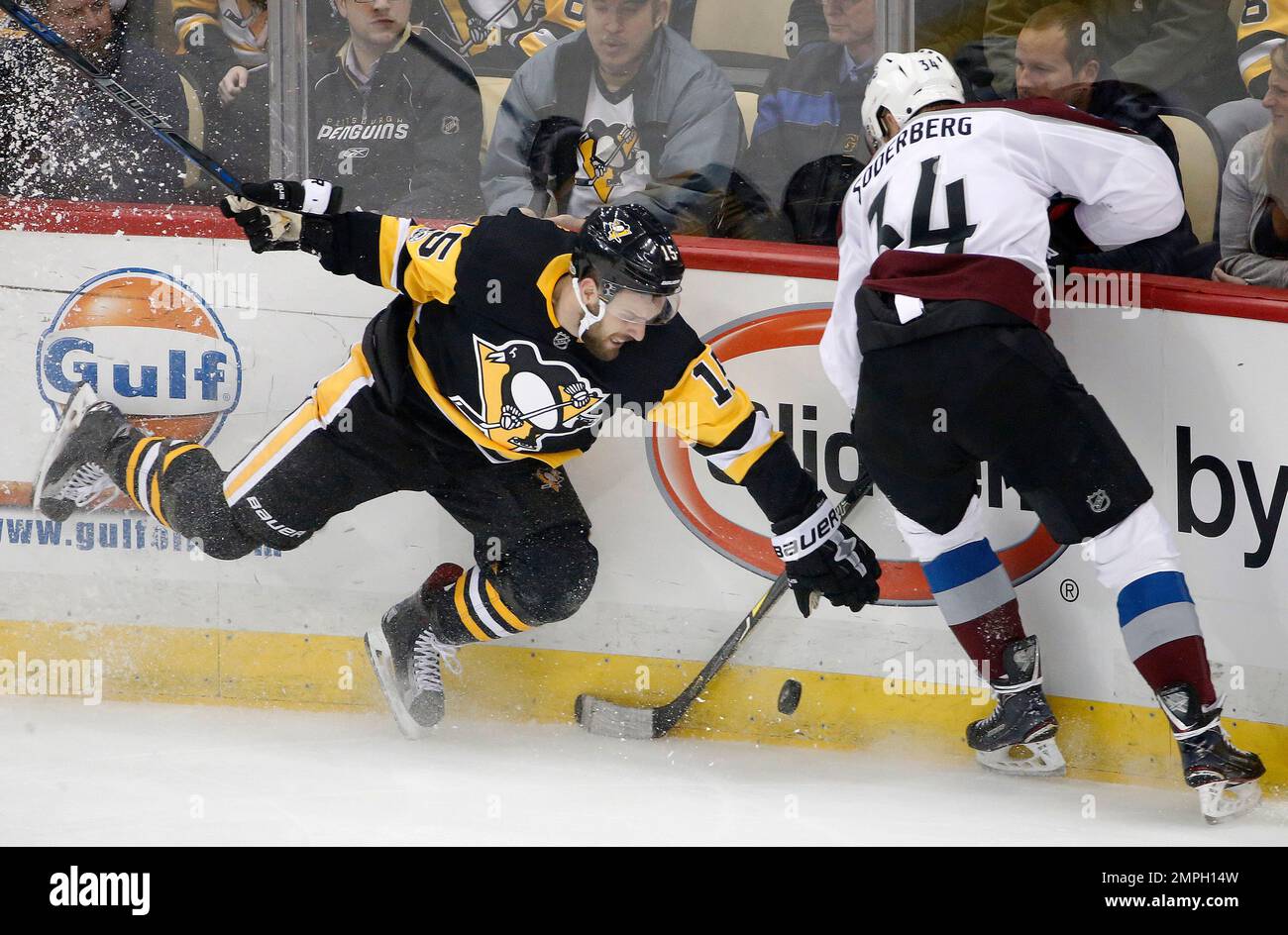 Pittsburgh Penguins' Riley Sheahan (15) collides with Colorado ...