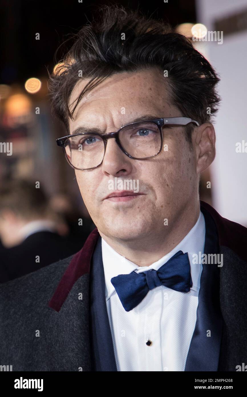 Director Joe Wright poses for photographers upon arrival at the ...