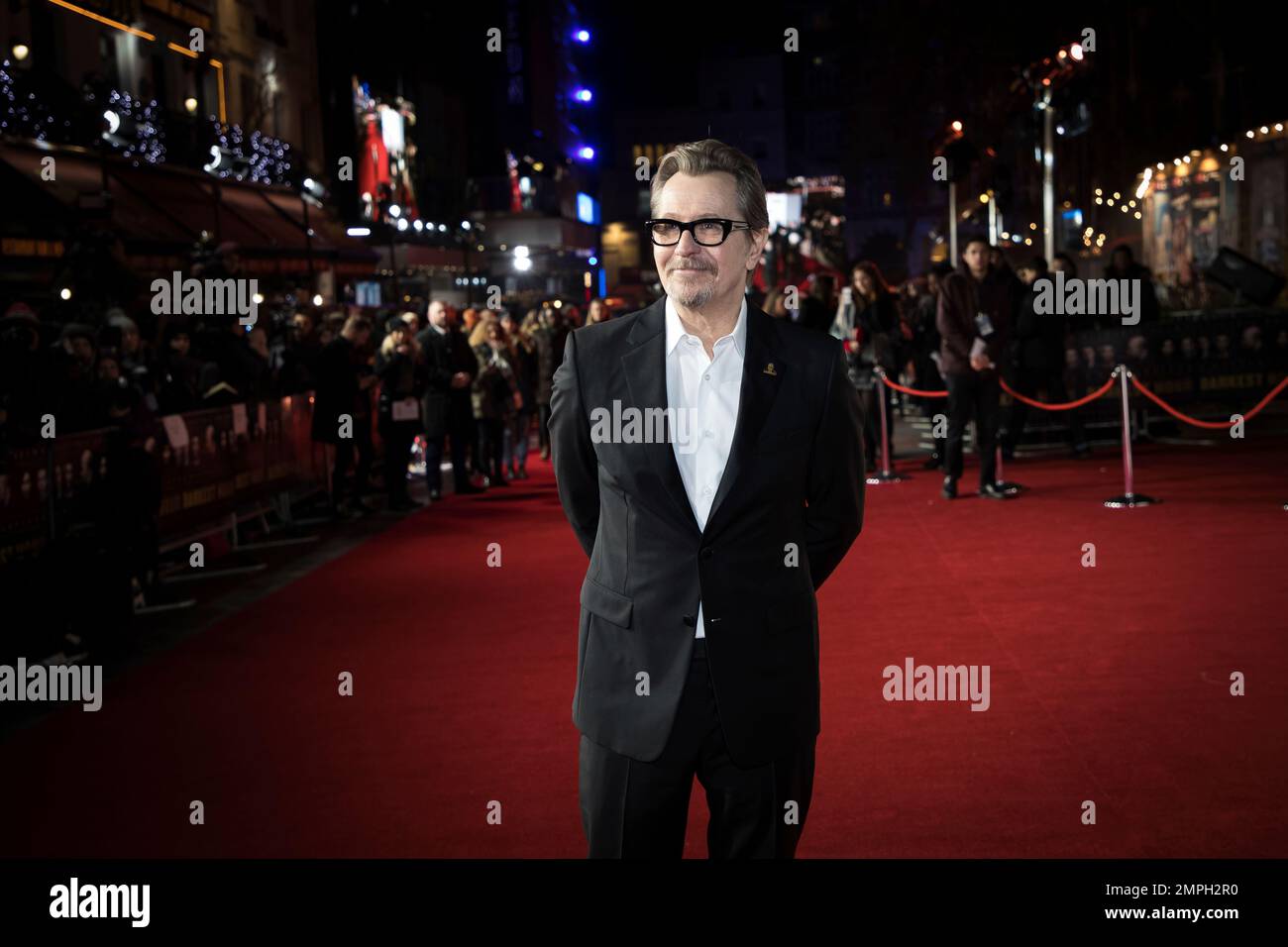 Actor Gary Oldman poses for photographers upon arrival at the premiere ...