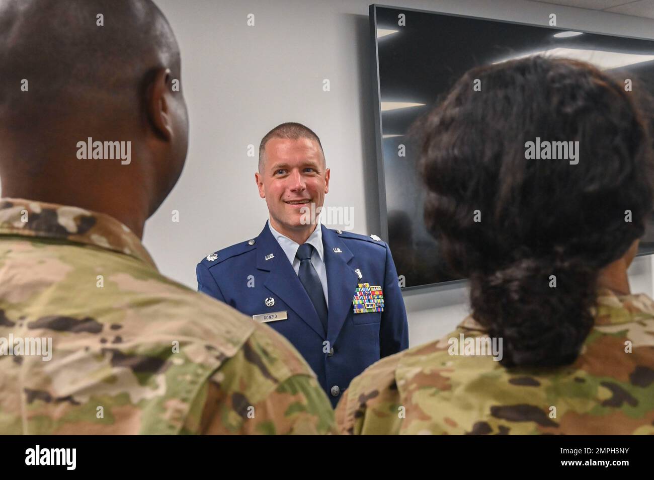 Lt. Col. Joseph Ronzio, commander of the 507th Medical Squadron, greets ...