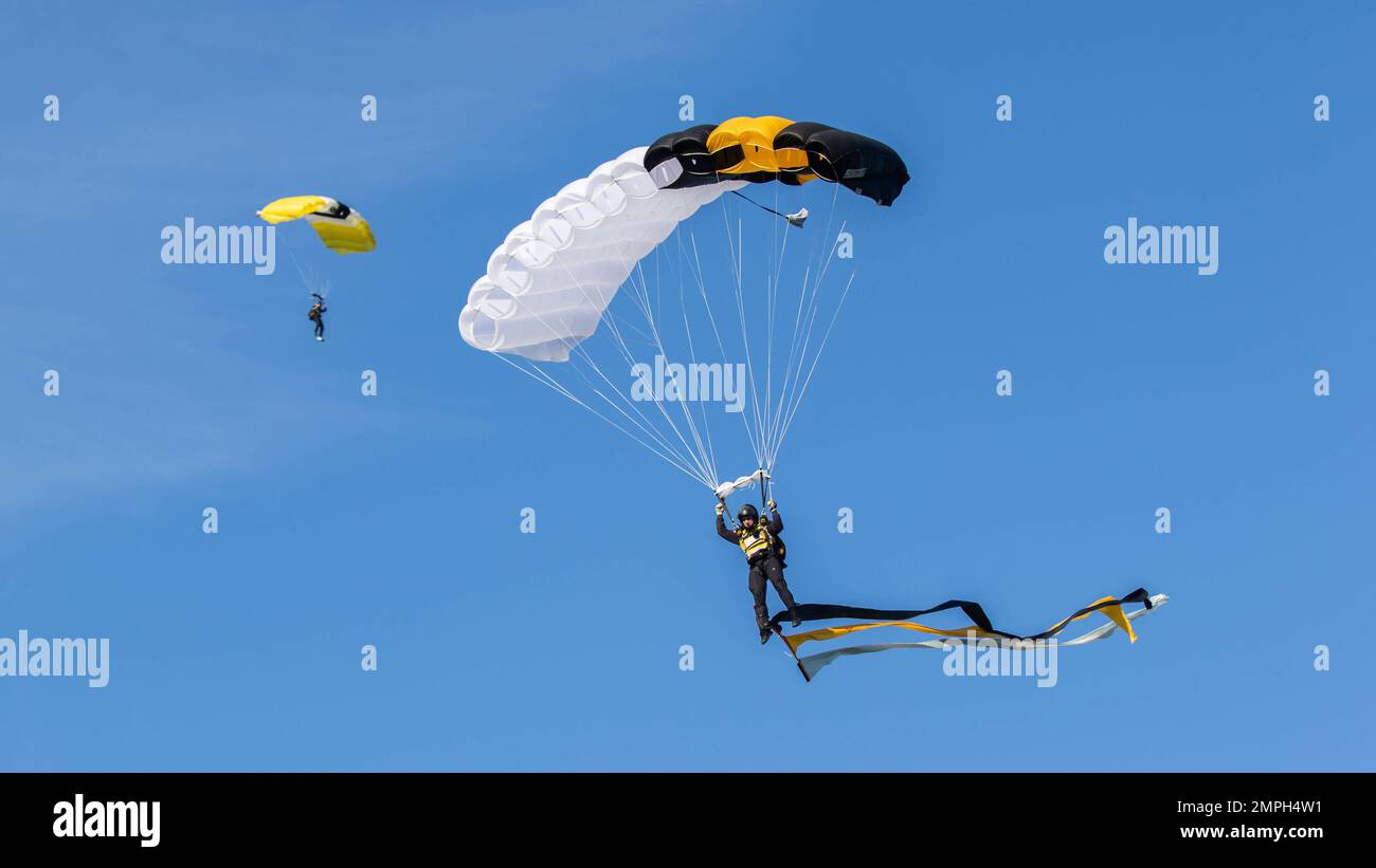Two cadets on the West Point Parachute Team fly into Michie Stadium ...