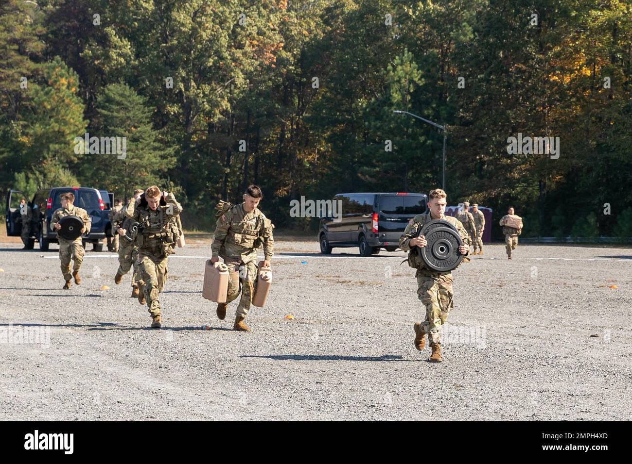 Cadets from the University of Virginia race equipment down to the ...