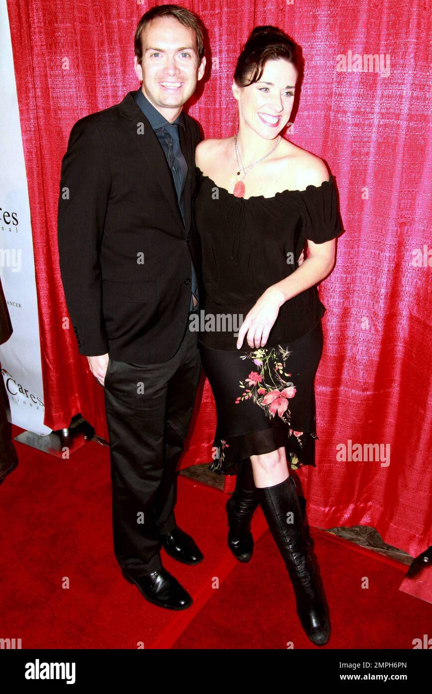 Danielle Petty and her companion walk the post-Golden Globes red carpet ...