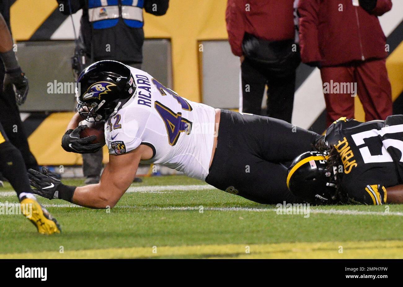 Baltimore Ravens fullback Patrick Ricard (42) dives into the end zone ...