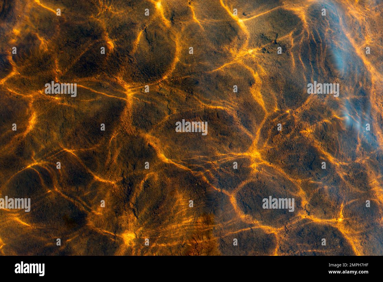 Background . Bright reflection of sunlight from the waves of clear ...