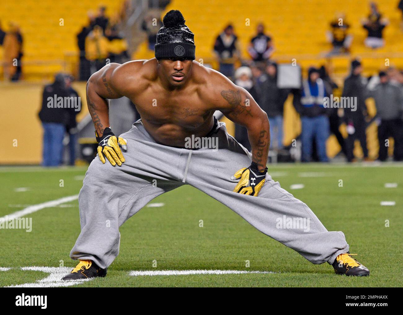 Pittsburgh Steelers outside linebacker James Harrison stretches during ...