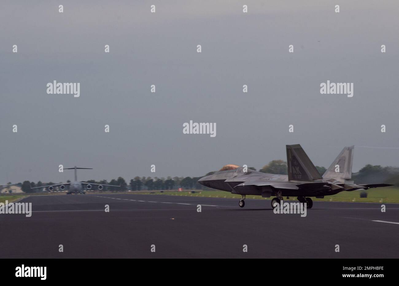 A U.S. Air Force F-22 Raptor assigned to the 90th Expeditionary Fighter ...