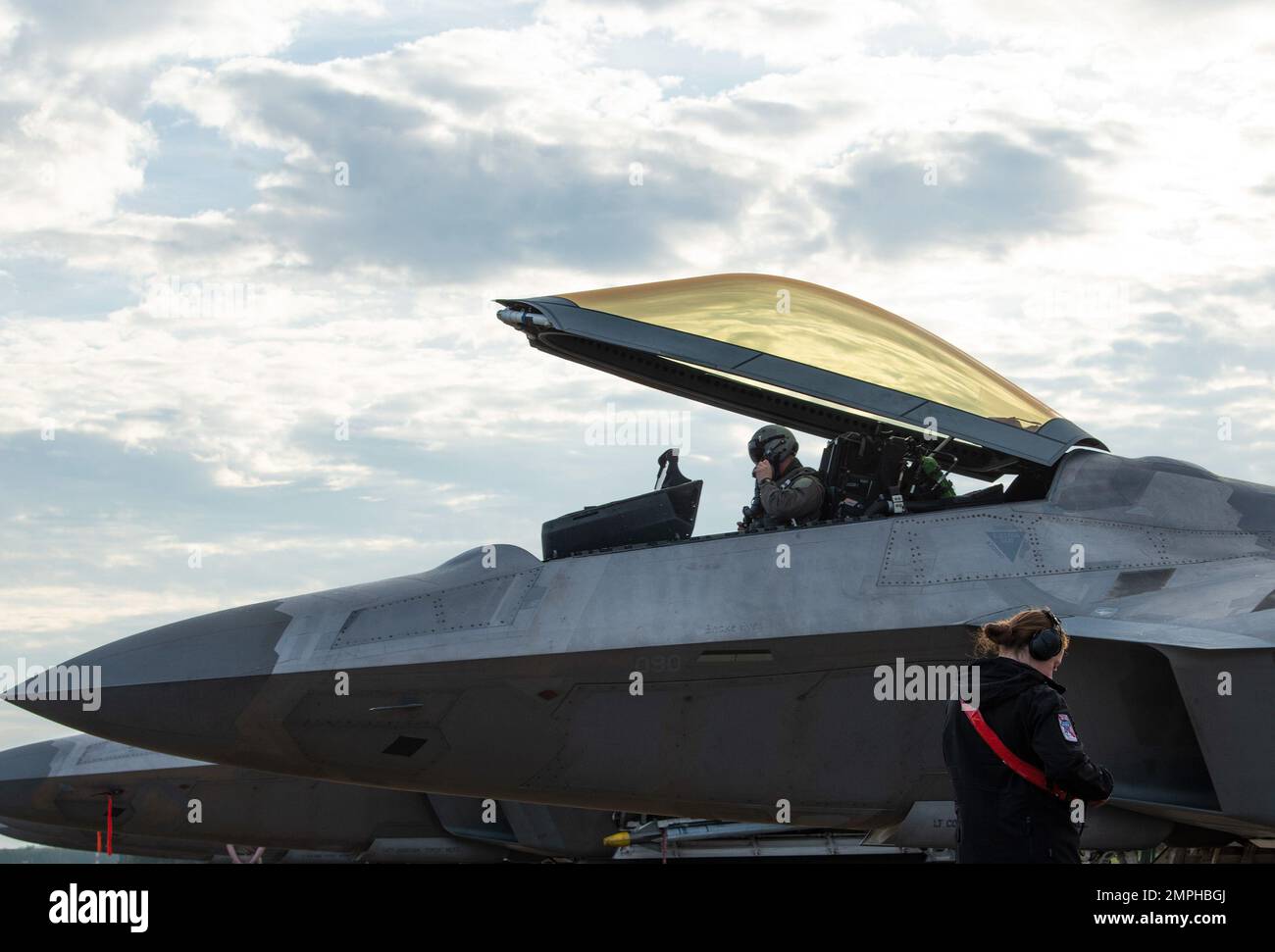A U.S. Air Force F-22 Raptor pilot assigned to the 90th Expeditionary Fighter Squadron conducts ...