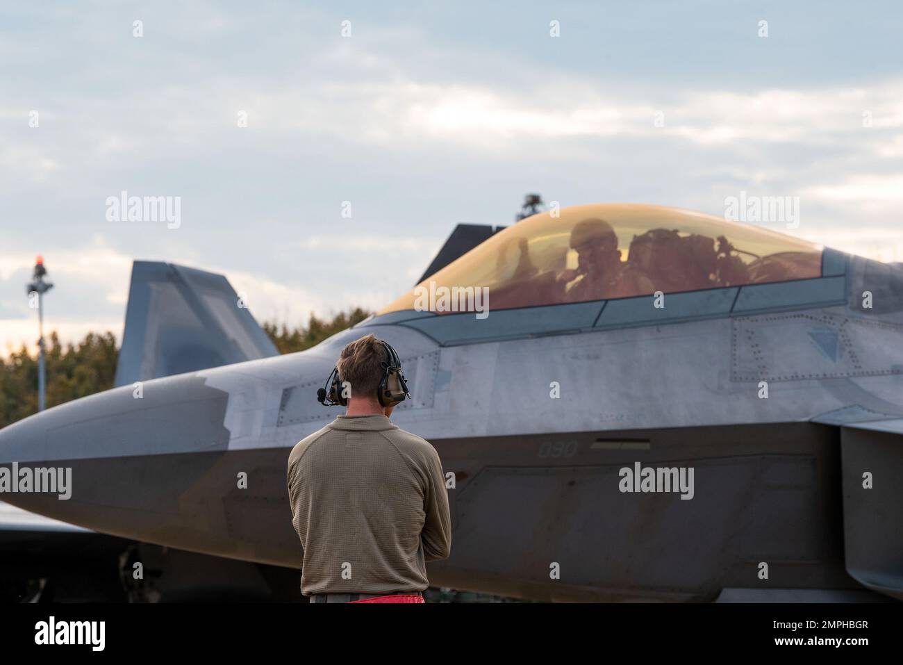 A U.S. Air Force crew chief assigned to the 90th Expeditionary Fighter ...