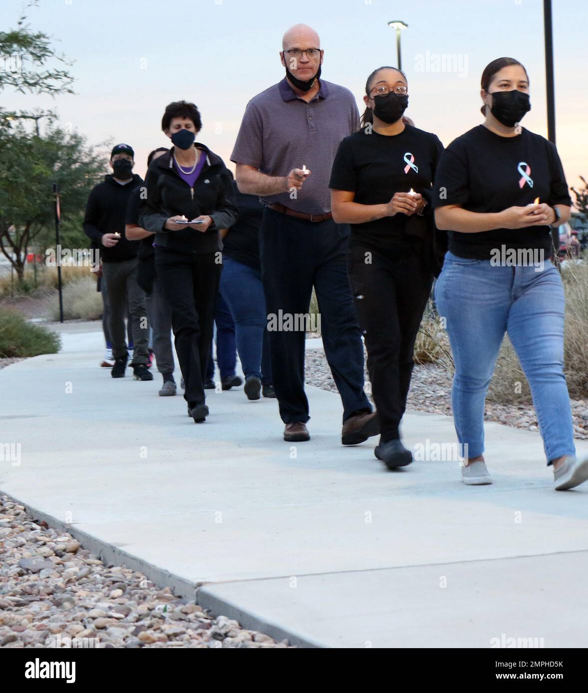 Parents, families, and staff members shared a solemn walk of ...