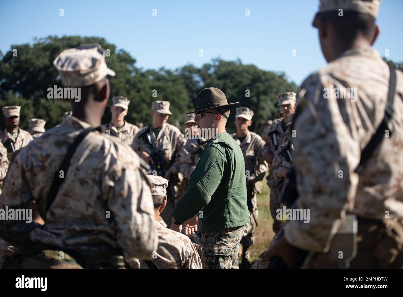 Recruits with Delta Company, 1st Recruit Training Battalion, aim at a ...