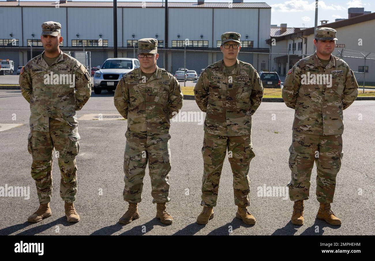 Soldiers from Alpha Company, 304th ESB-E Battalion, receive coins for ...