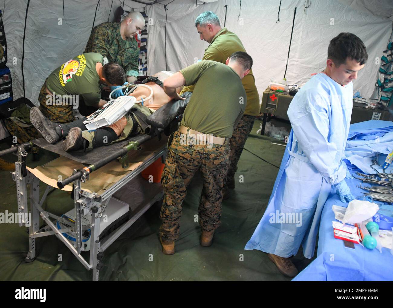 2nd Medical Battalion medical personnel prepare to operate on a ...