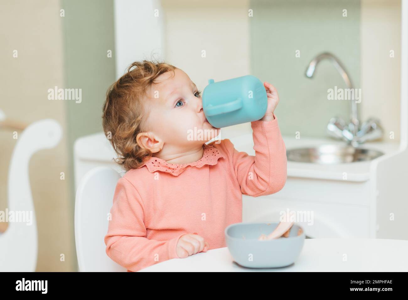 Infant water cup hi-res stock photography and images - Alamy