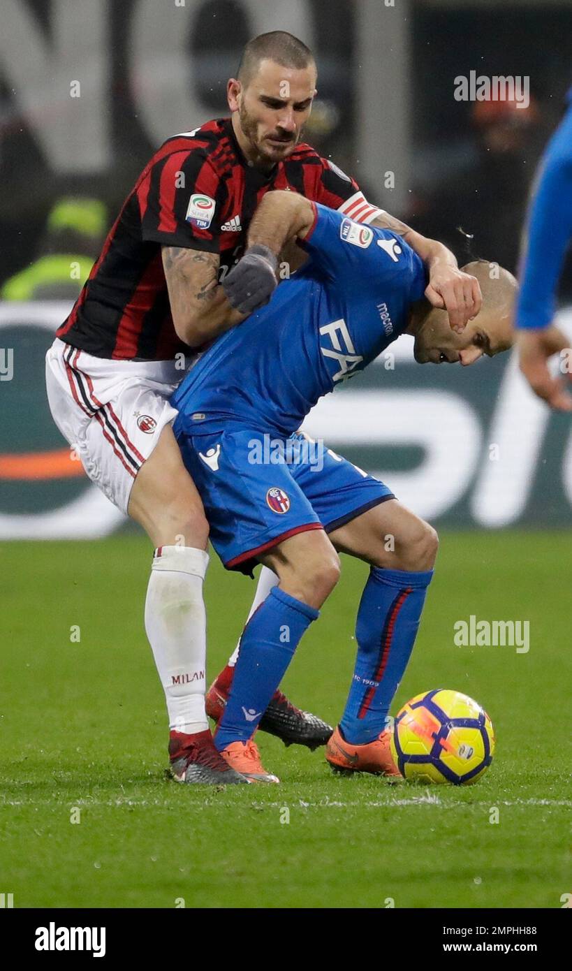 AC Milan's Leonardo Bonucci , left, challenges Bologna's Rodrigo ...