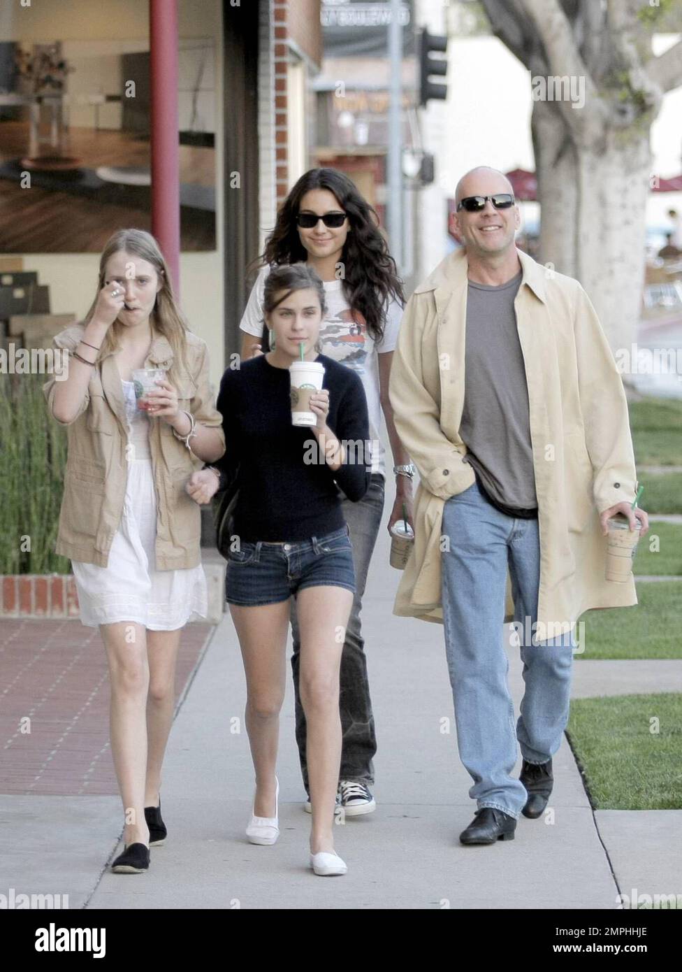 Bruce Willis got in some shopping on Robertson Blvd. today with his new ...