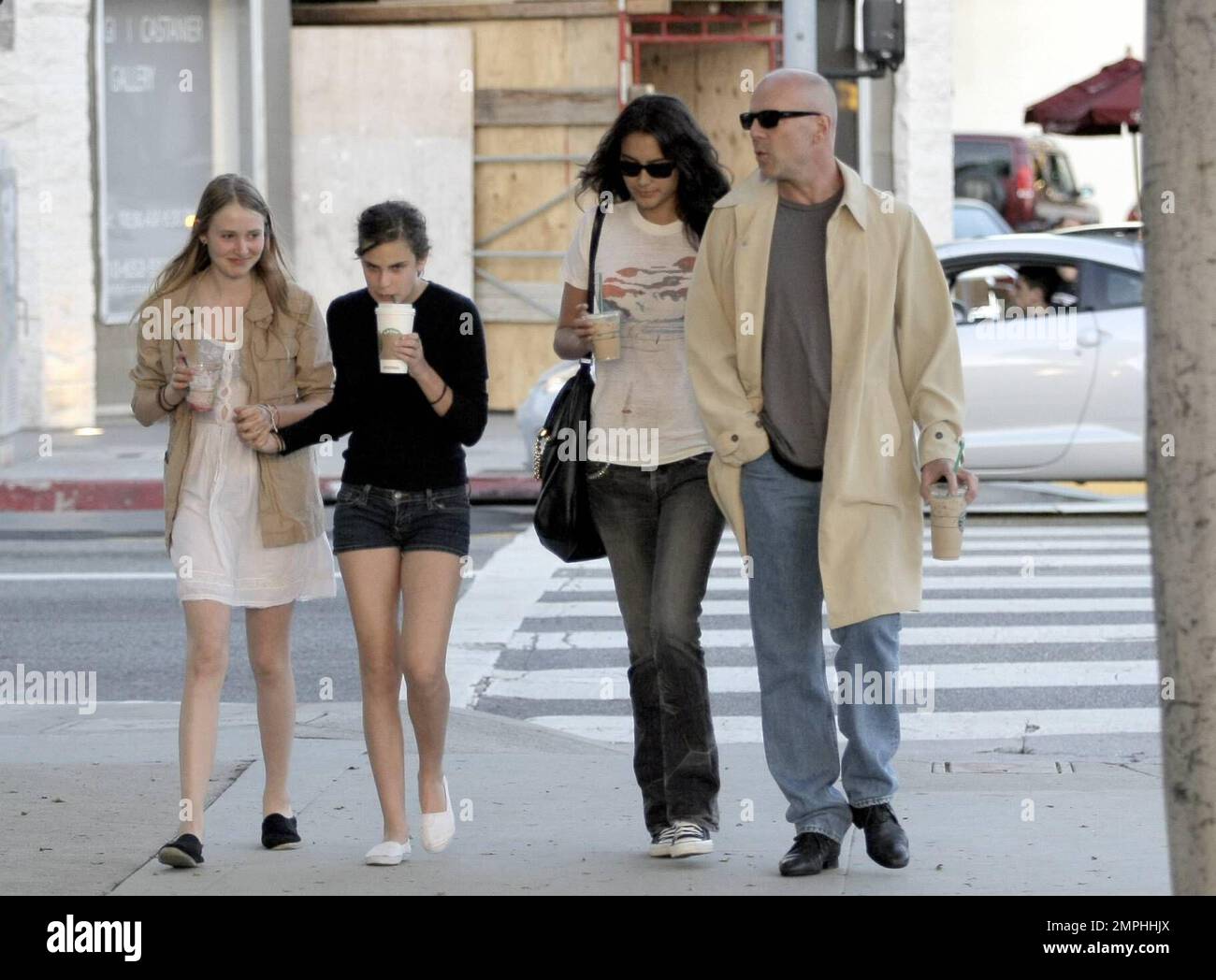 Bruce Willis got in some shopping on Robertson Blvd. today with his new ...