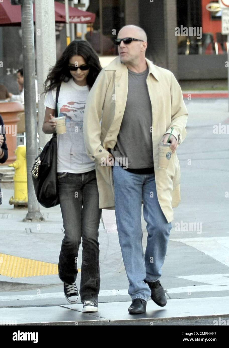 Bruce Willis got in some shopping on Robertson Blvd. today with his new ...