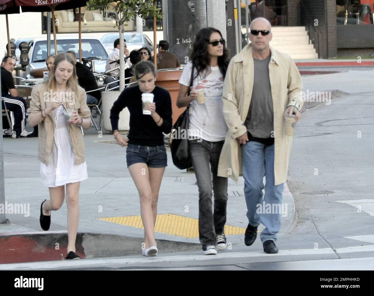 Bruce Willis got in some shopping on Robertson Blvd. today with his new ...