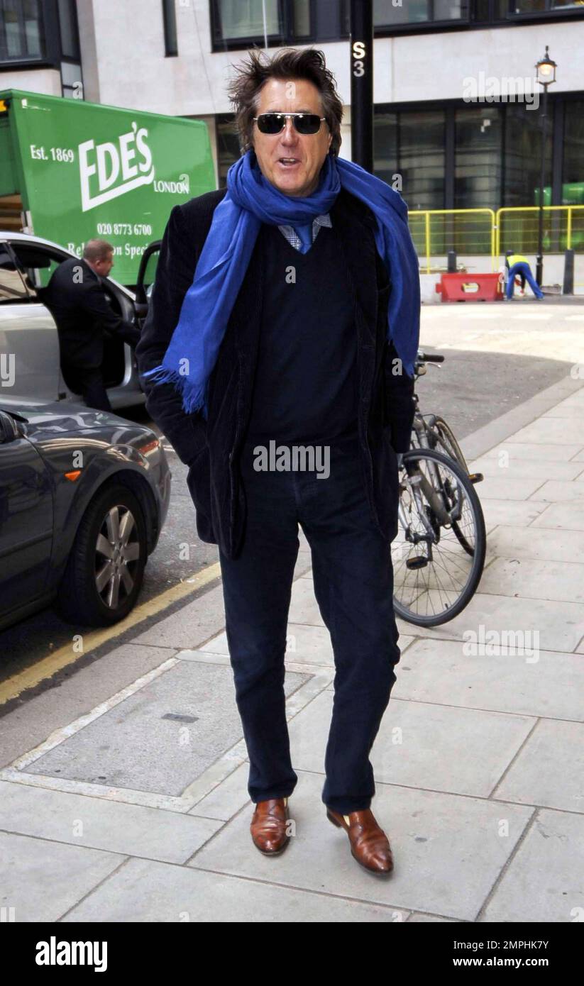 Former Roxy Music frontman Bryan Ferry is all smiles as he arrives at ...