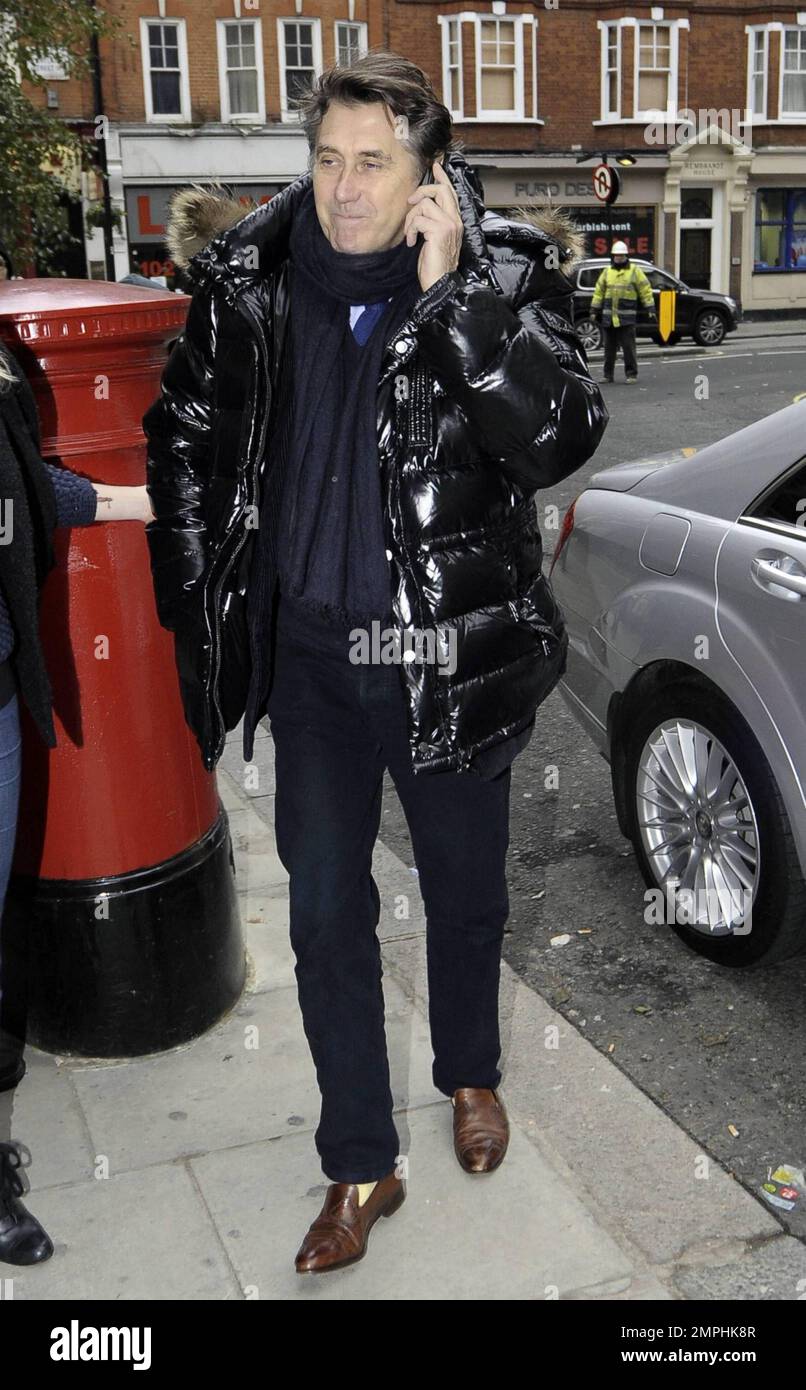 Bryan Ferry chats on his cellphone as he arrives at BBC Radio 2. Ferry ...