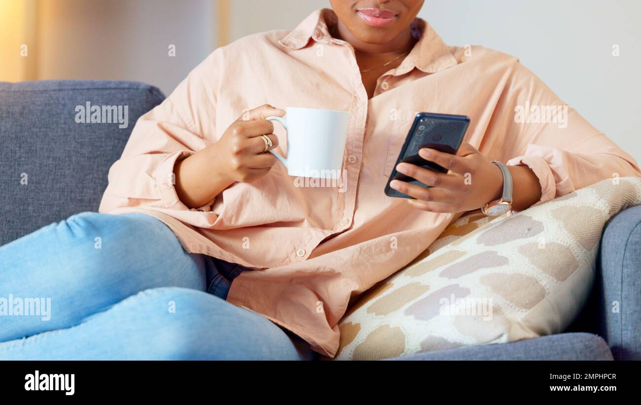 Woman reading a phone with funny memes on social media, drinking coffee ...
