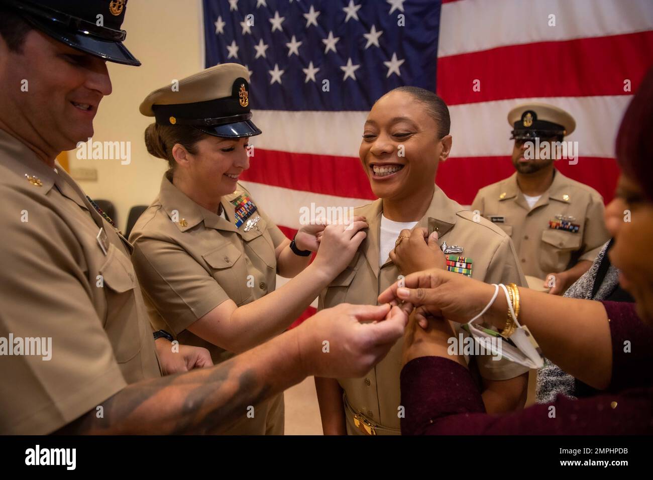 NAVAL STATION NORFOLK (Oct. 21, 2022) Family members and mentors pin ...