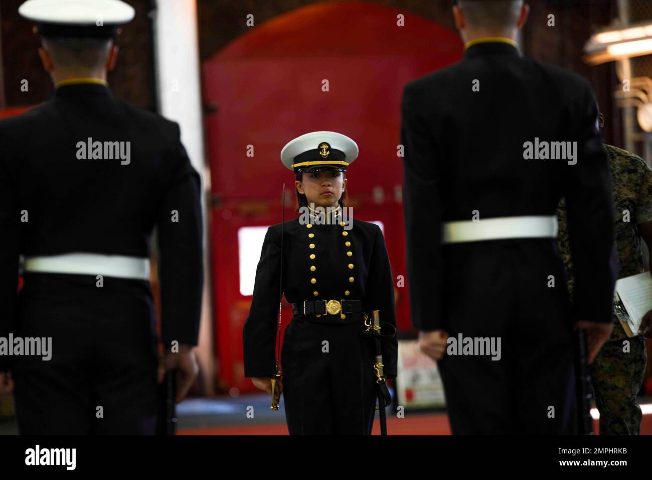 A U.S. Naval Reserve Officer Training Corps Drill Team conducts a ...