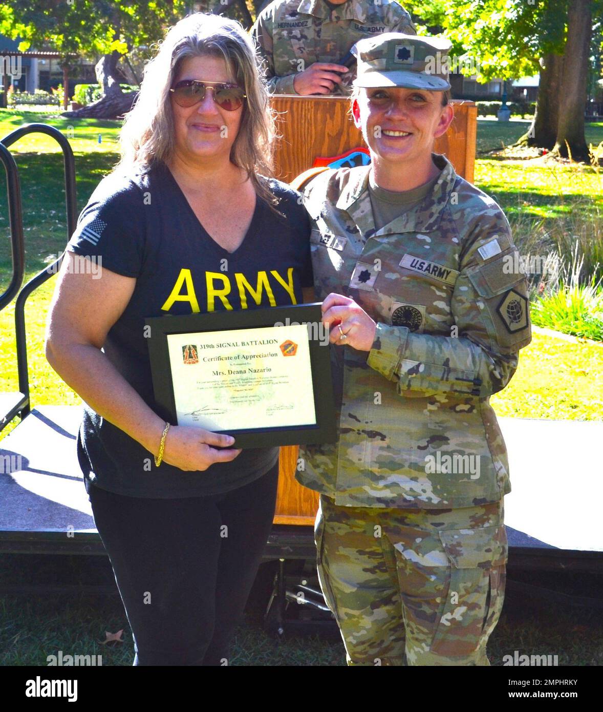 Lt. Col. Stephanie Lee, 319th Signal Battalion commander, presented ...