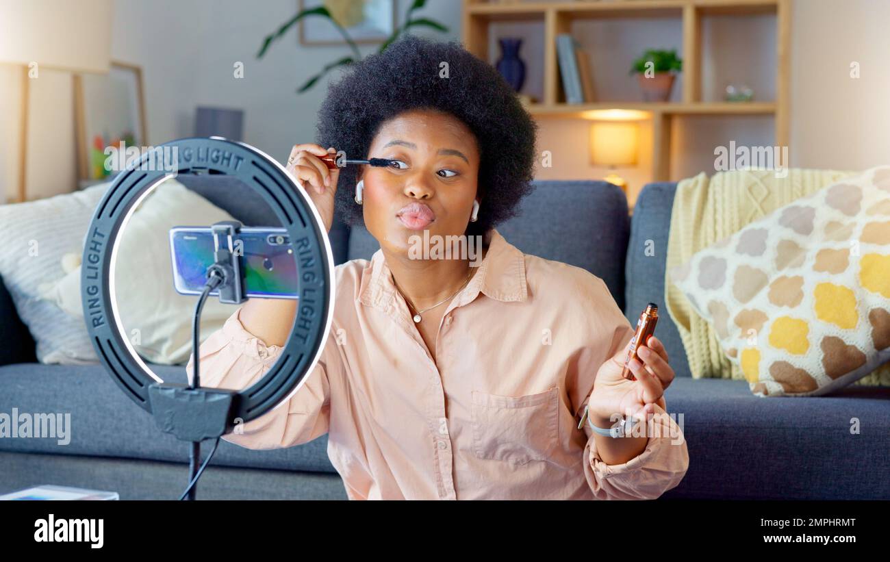 Afro beauty influencer, vlogger or podcast host talking, using phone to ...
