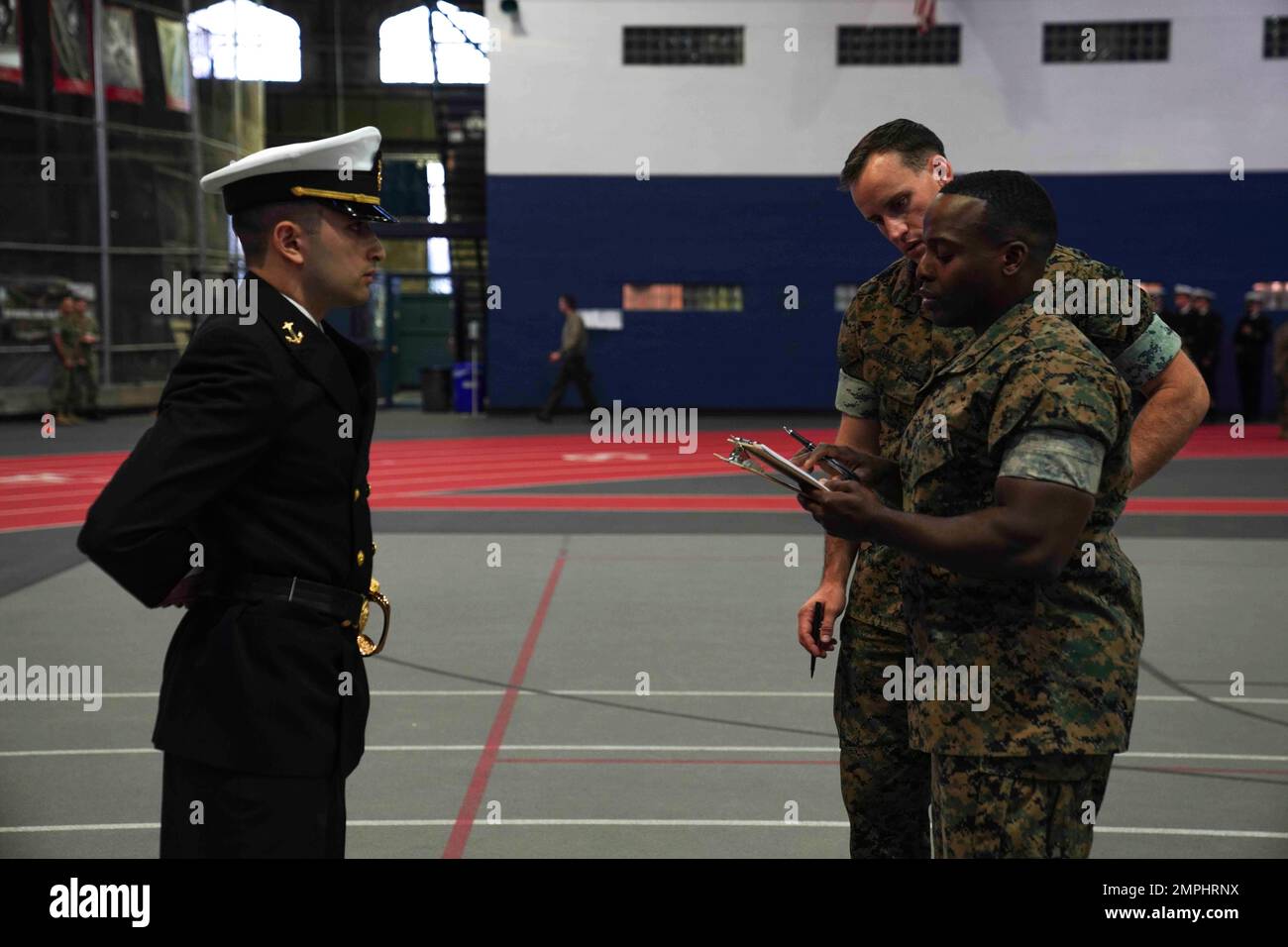 U.S. Marine Corps Gunnery Sgt. Tafari N. Delsol, right, a sergeant instructor with Naval Reserve ...