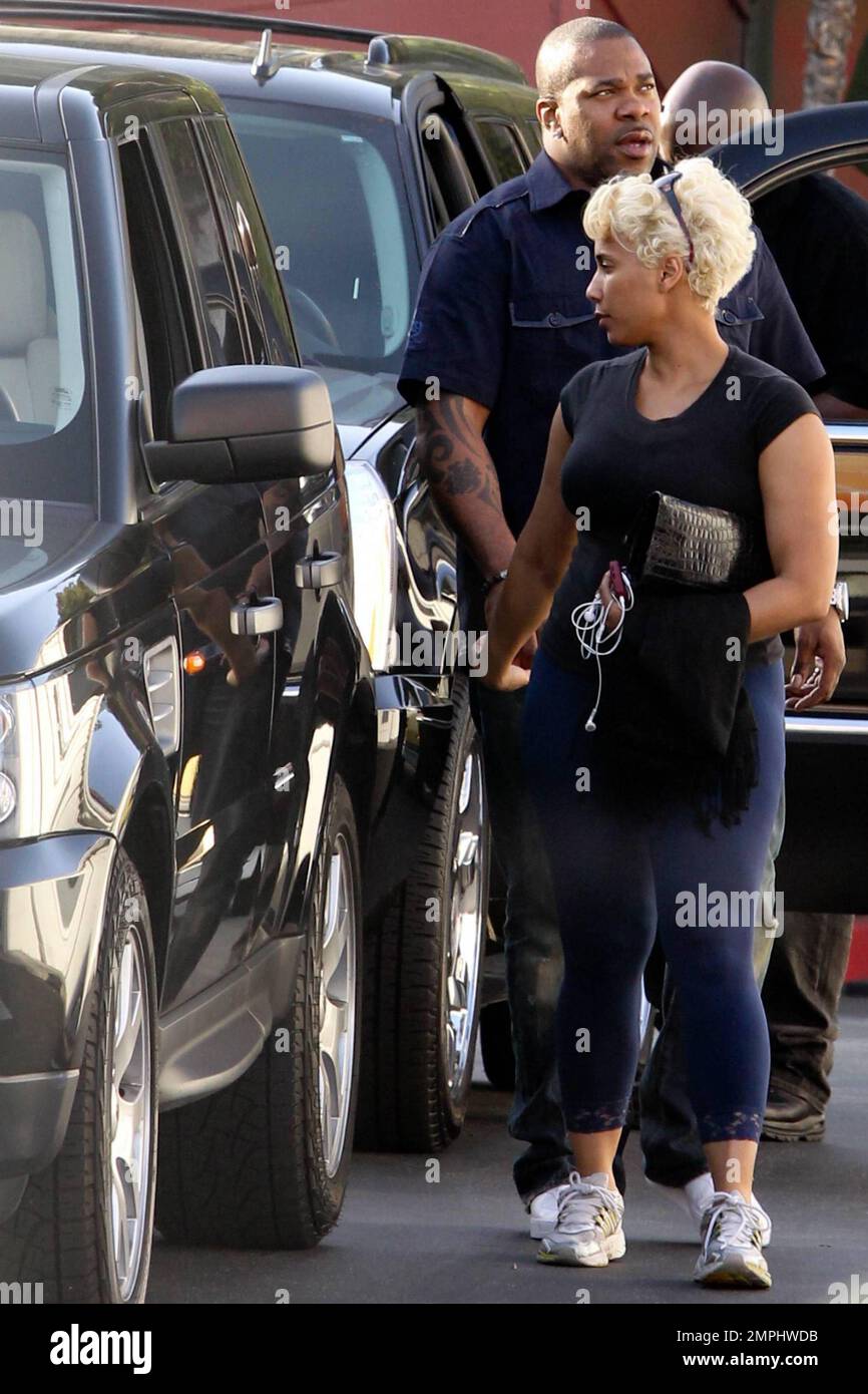 EXCLUSIVE!! Rapper Busta Rhymes gets intimate with a ladyfriend after ...