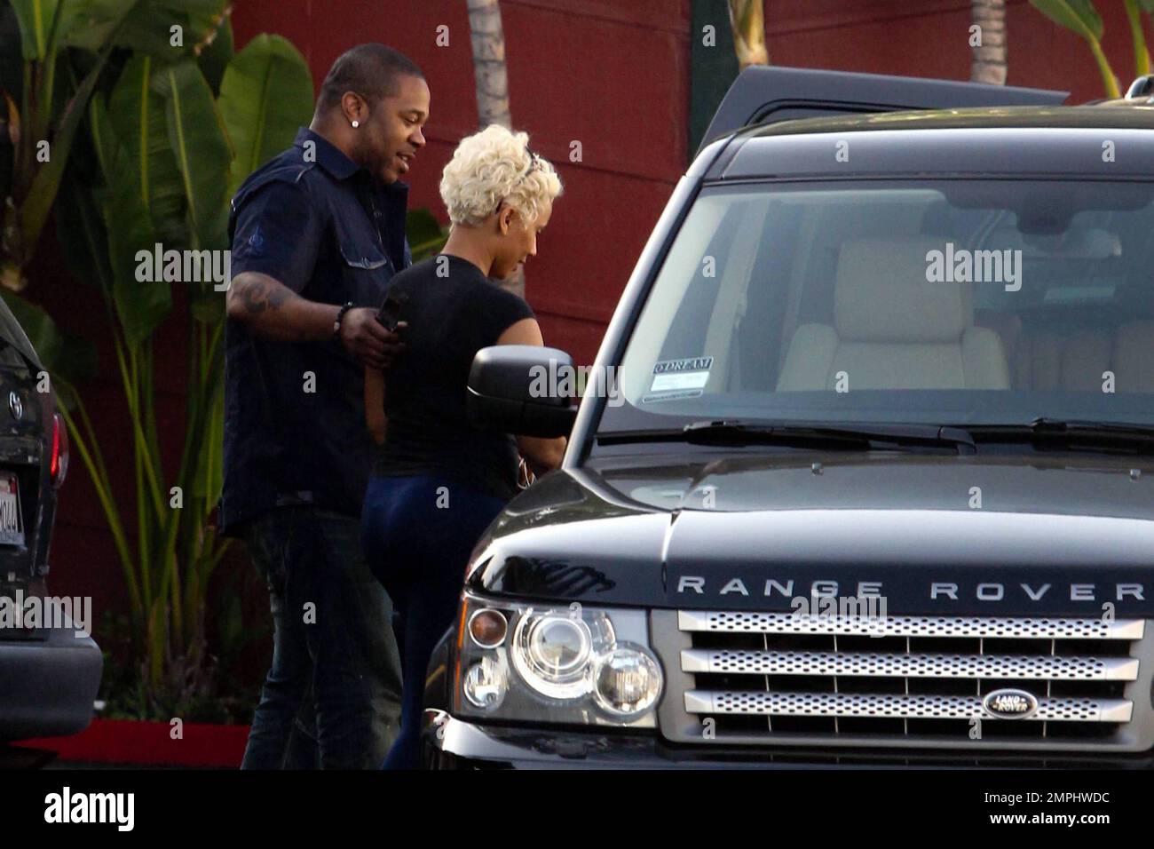 EXCLUSIVE!! Rapper Busta Rhymes gets intimate with a ladyfriend after ...