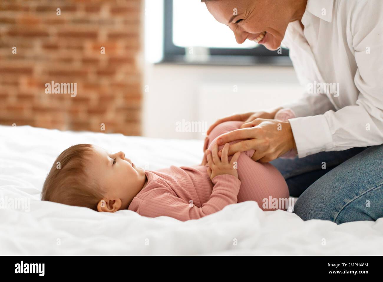 Mother and child connection. Loving mom bonding with her adorable ...