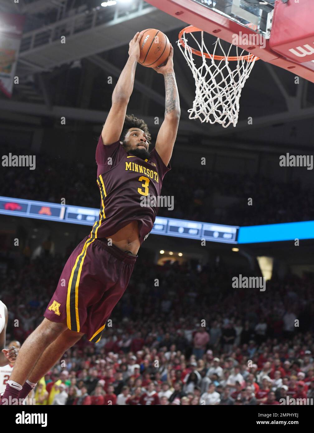 Minnesota forward Jordan Murphy goes up for a dunk on a fast break ...