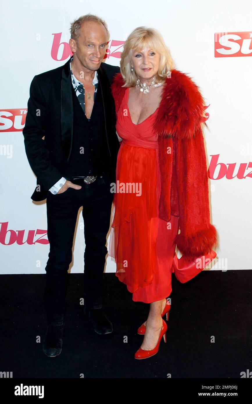 Robert Newmark and Liz Brewer arrive at the launch party for "The Buzz," the new Saturday ...