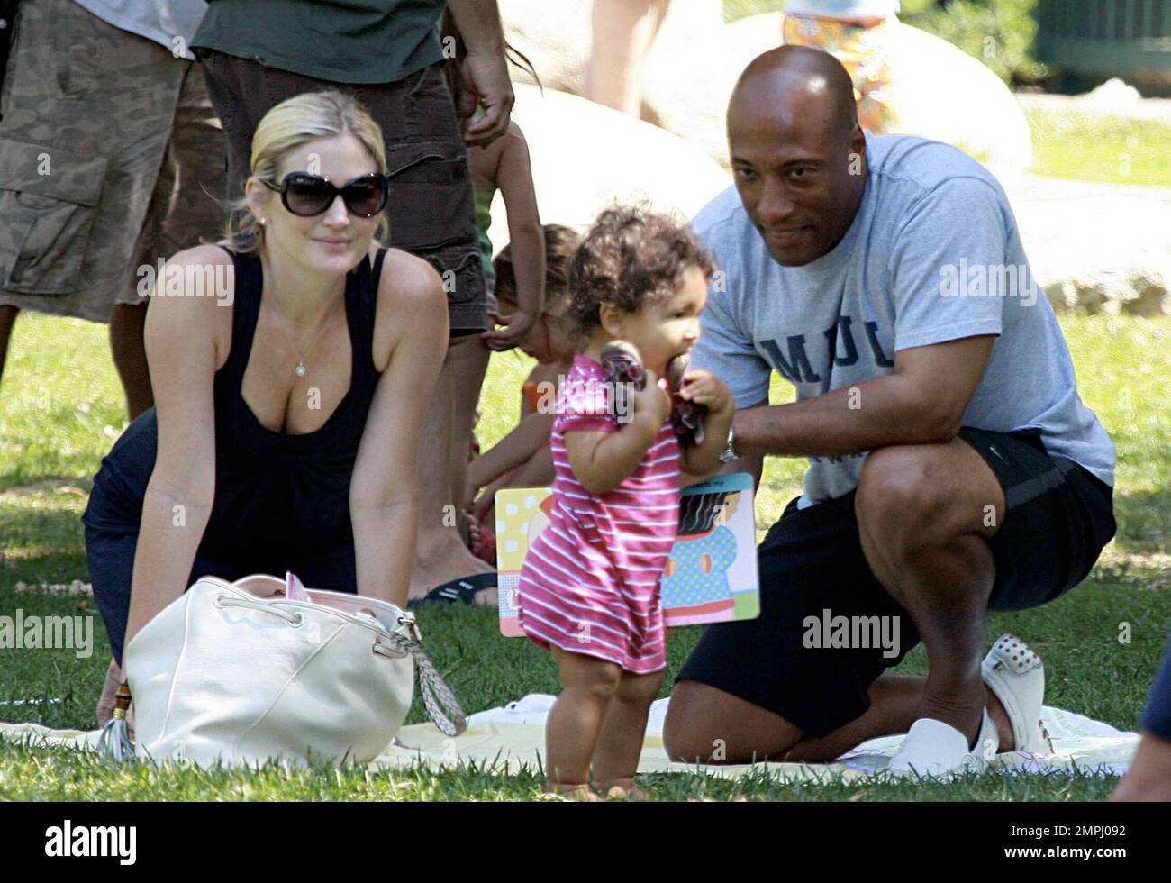 Comedian and talk show host Byron Allen enjoys a day at the park with ...