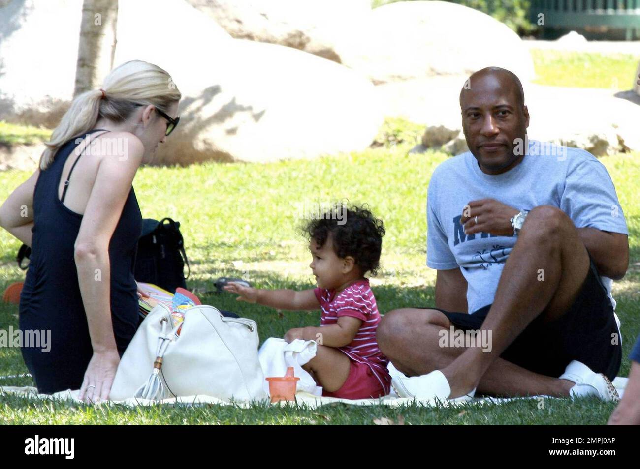 Comedian and talk show host Byron Allen enjoys a day at the park with ...