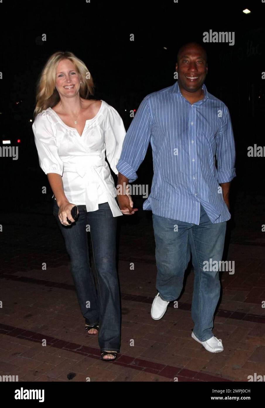 Comedian and talk show host Byron Allen enjoys a night out with wife ...