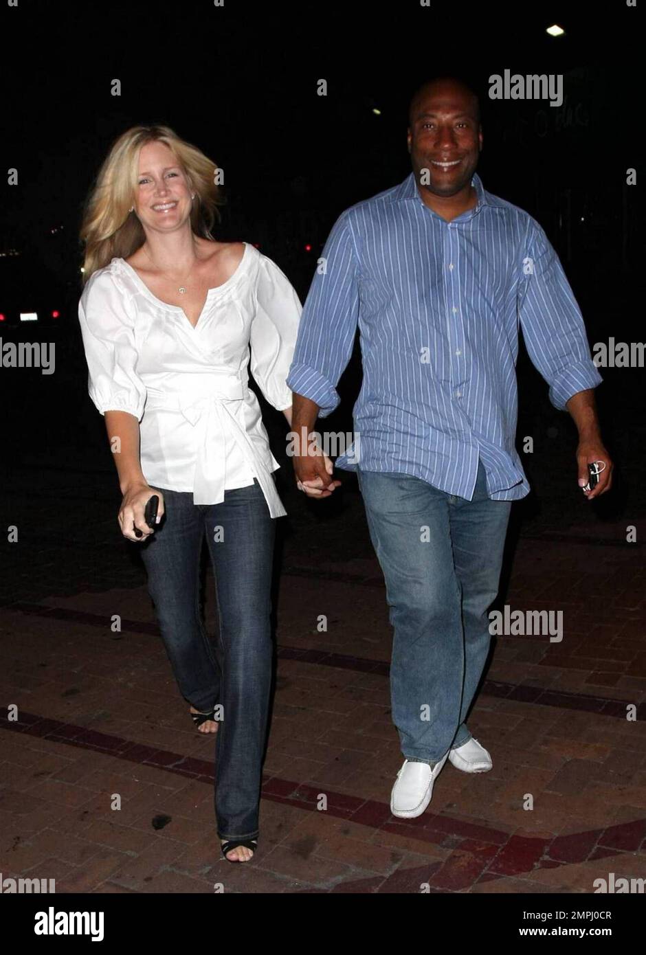 Comedian and talk show host Byron Allen enjoys a night out with wife ...