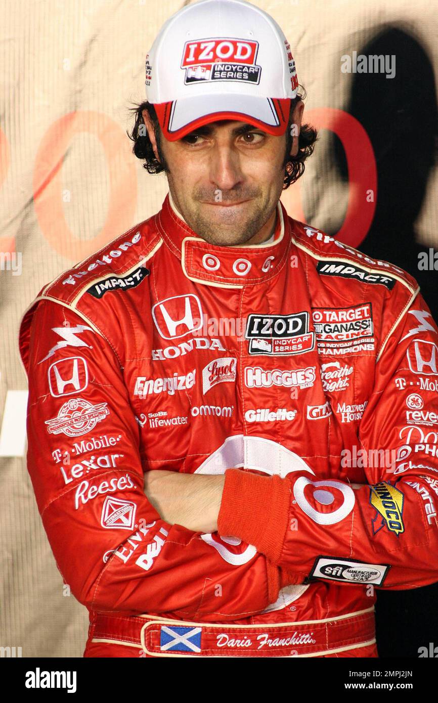 Indy Racing League driver Dario Franchitti and teammates celebrate his ...