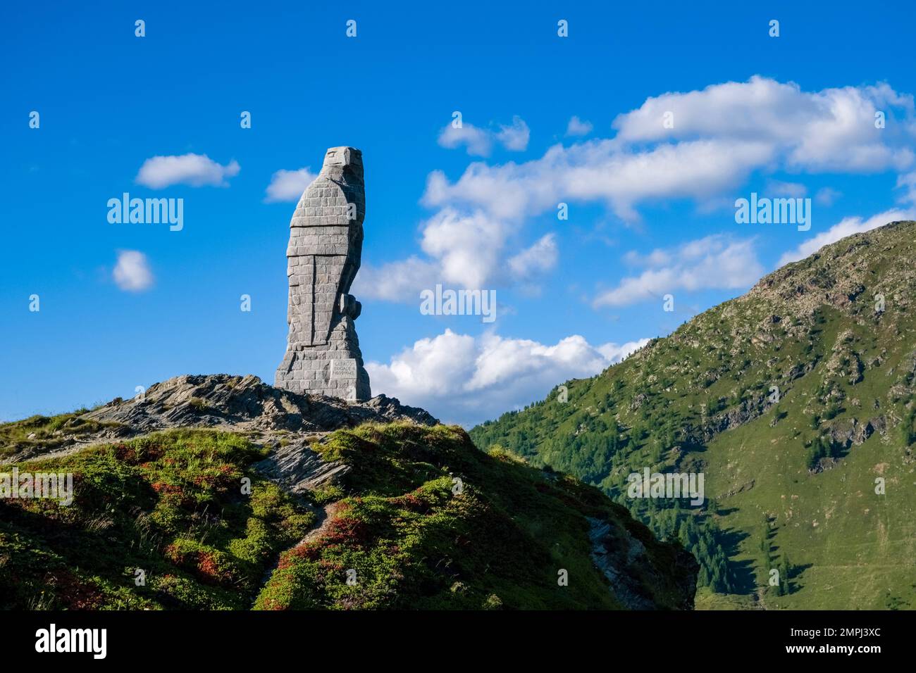 The stone monument of the Simplon Eagle on top of the mountain pass ...